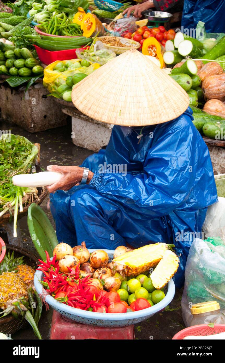 Vietnam: Fruit and vegetable vendor in a fresh market in Hue, central ...