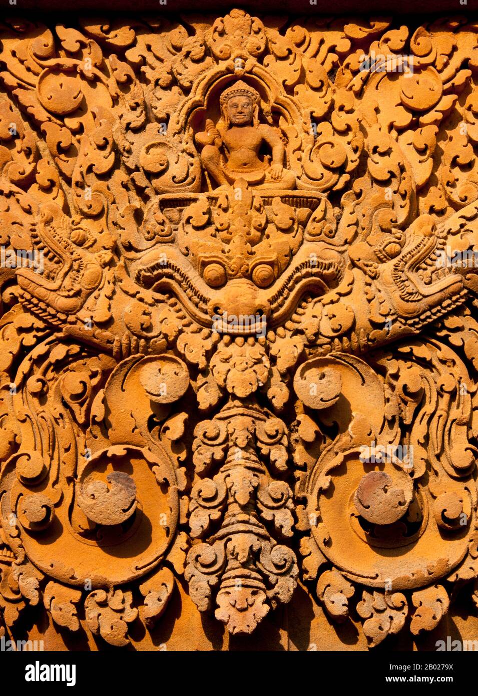 Cambodia: The Hindu god Shiva sits above the demon Kala, Banteay Srei ...