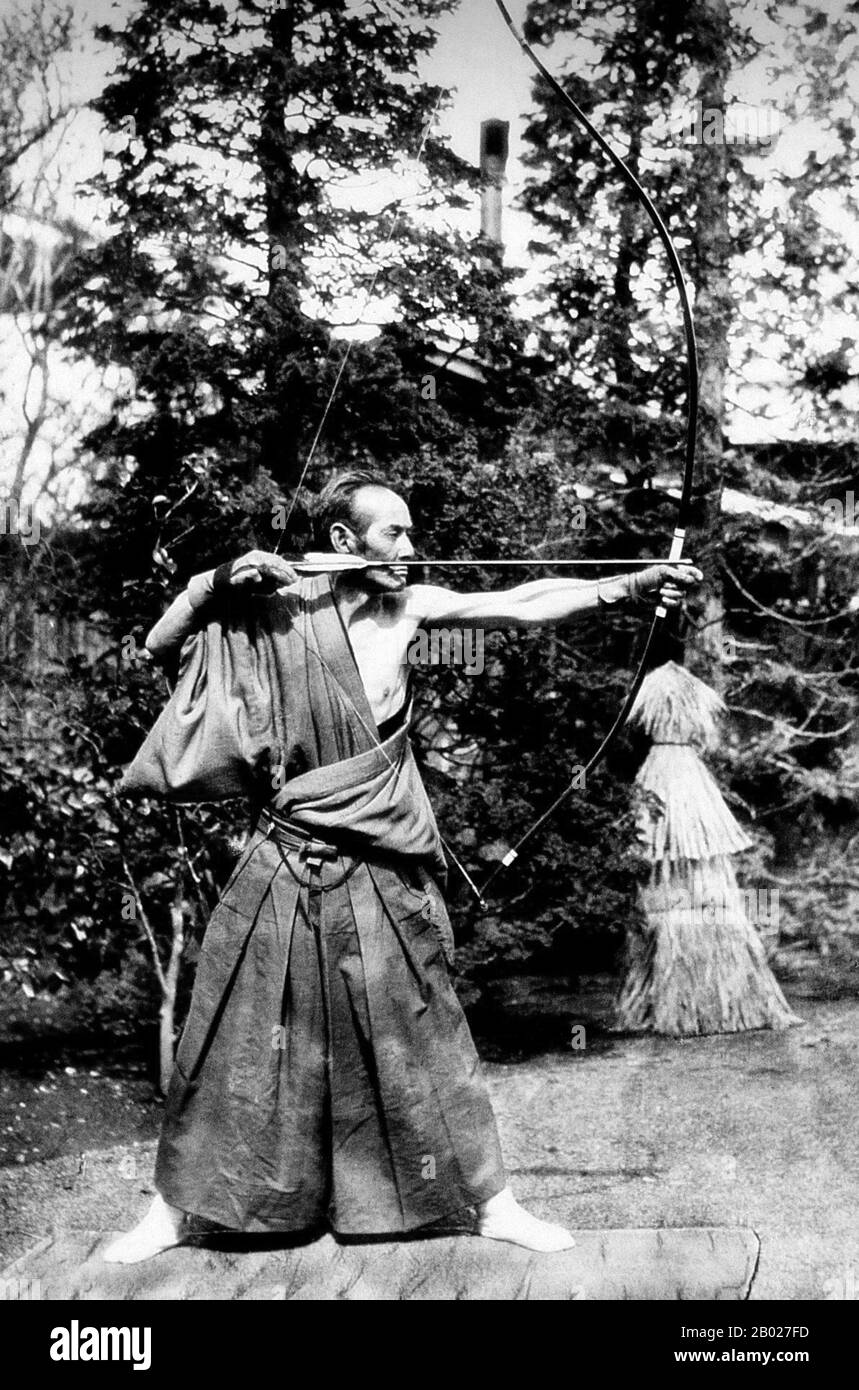 Japan: An archer with bow at full stretch. Photo published by George ...