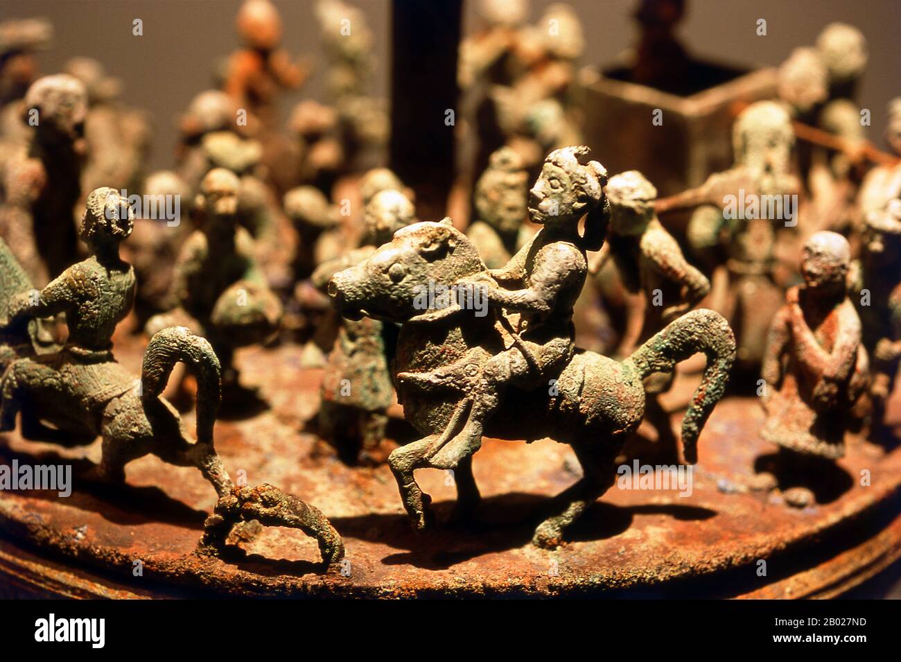 China: A cowrie container with a lid showing a battle between Dian ...