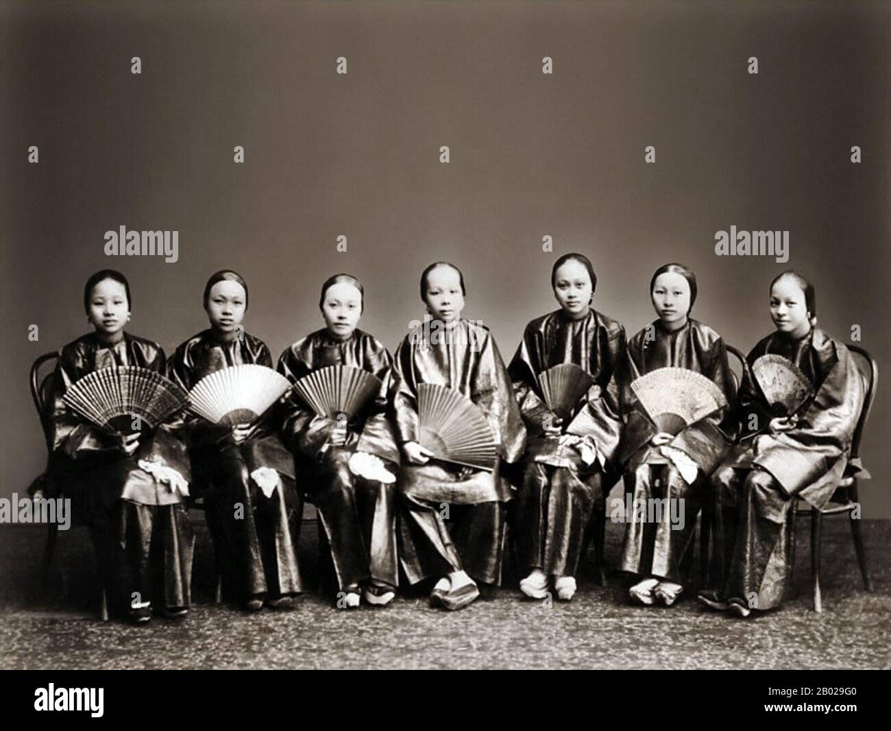 China: A studio photograph of seven Chinese women posing with fans ...
