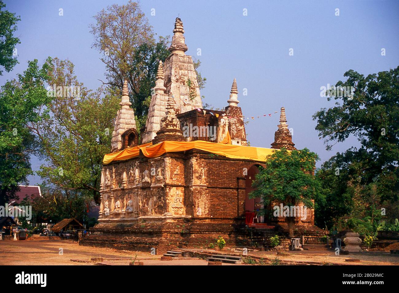 Thailand: Stucco thewada (angels) adorn the Maha Chedi (Great Chedi ...