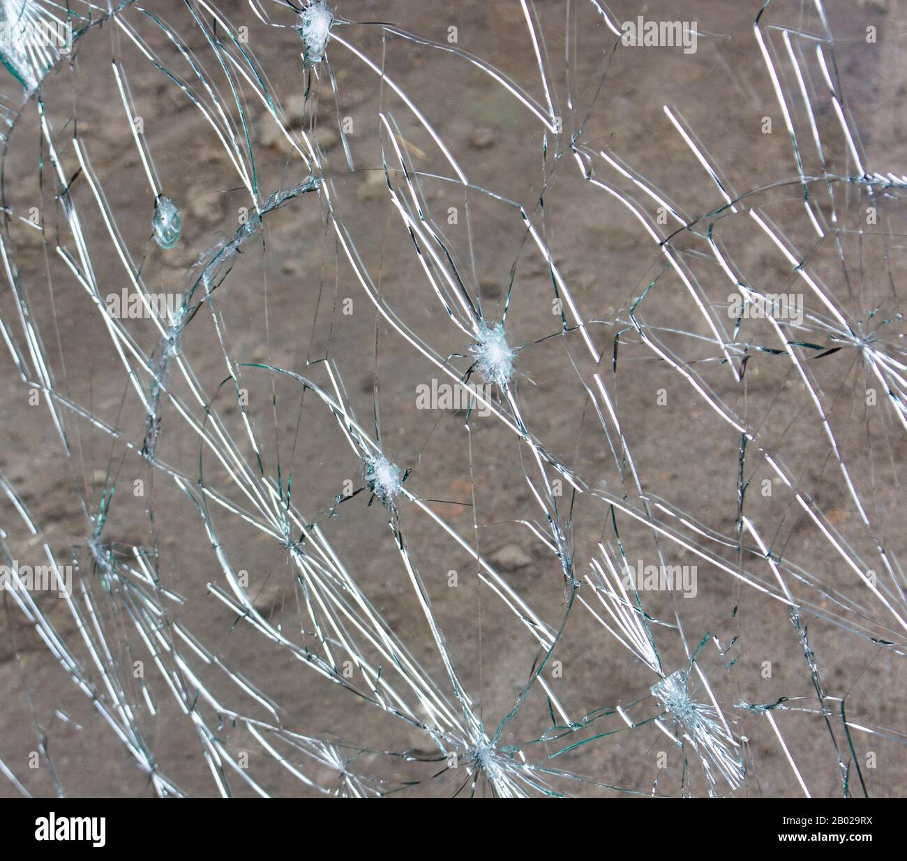 Broken car windshield, cracks in glass due to accident Stock Photo - Alamy