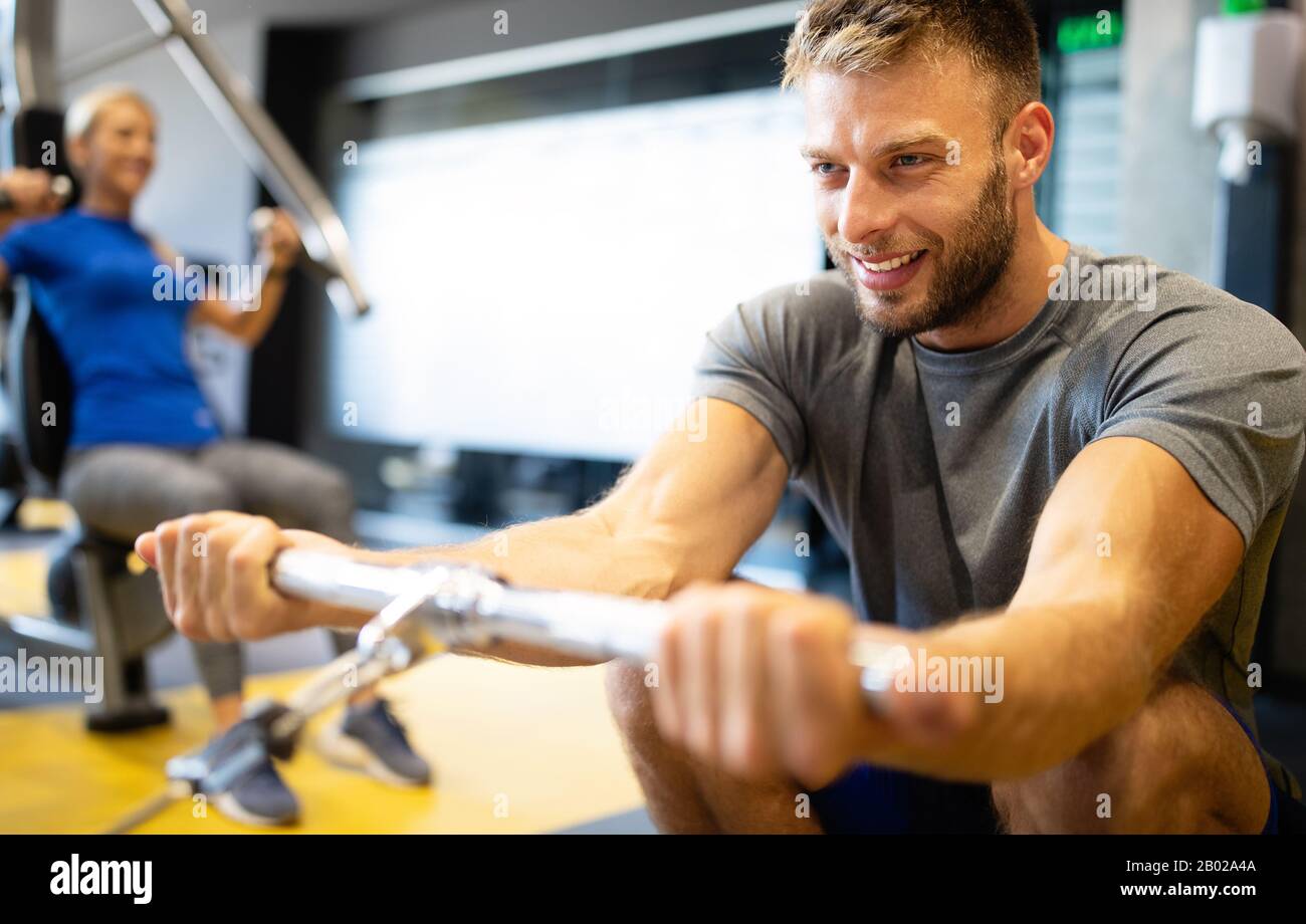 Sportsman doing exercise barbell biceps hi-res stock photography and ...
