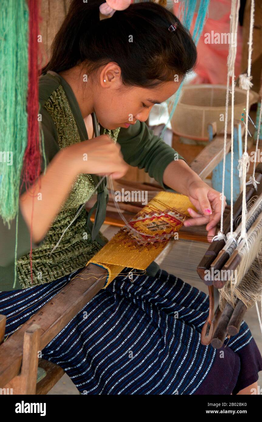 The art of weaving is a method of fabric production, like braiding ...
