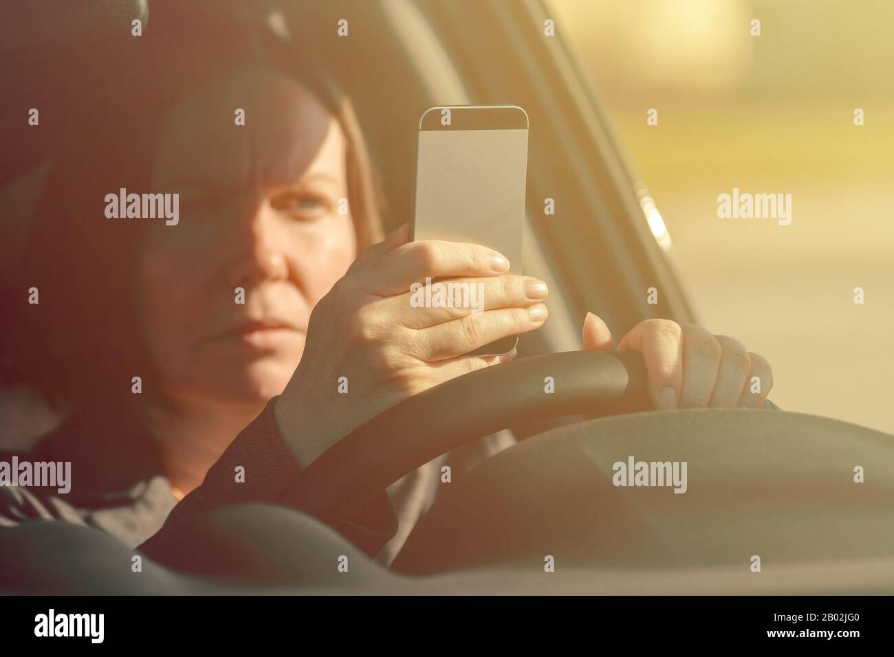 Mobile phone car driving hi-res stock photography and images - Alamy