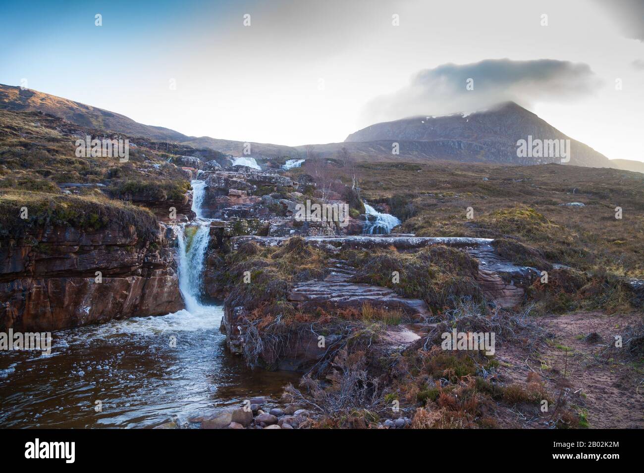 The Ardessie waterfalls with the Corbett Sail Mhor in the background ...
