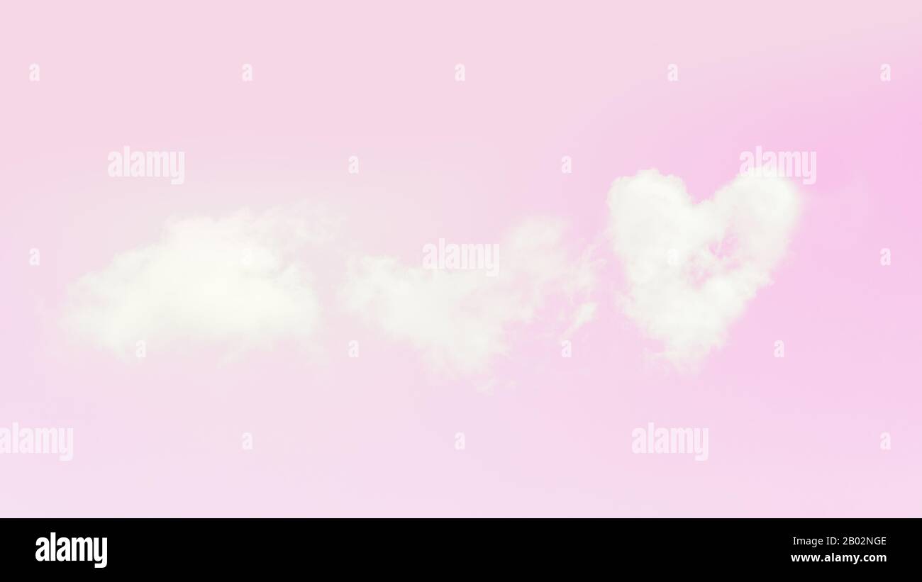 Love romantic background, heart shaped cloud, pink sky. 16:9 panoramic ...