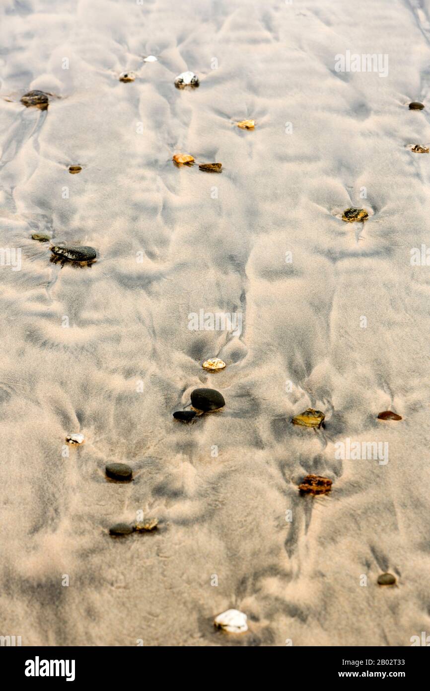Patterns and Pebbles in the sand at low tide, St Ives, Cornwall ...