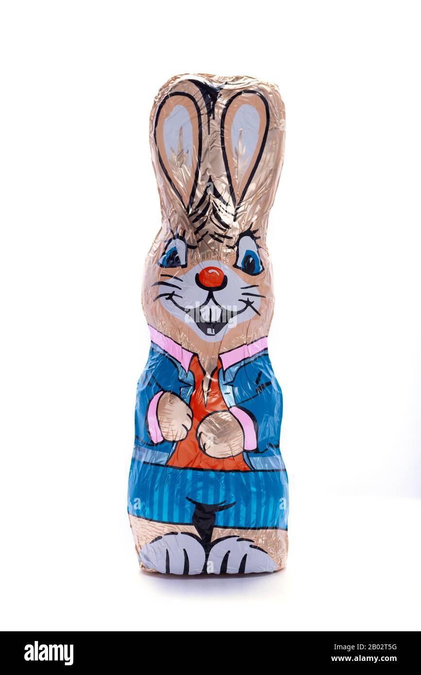 Chocolate Easter bunny on an isolated white background, male figure ...