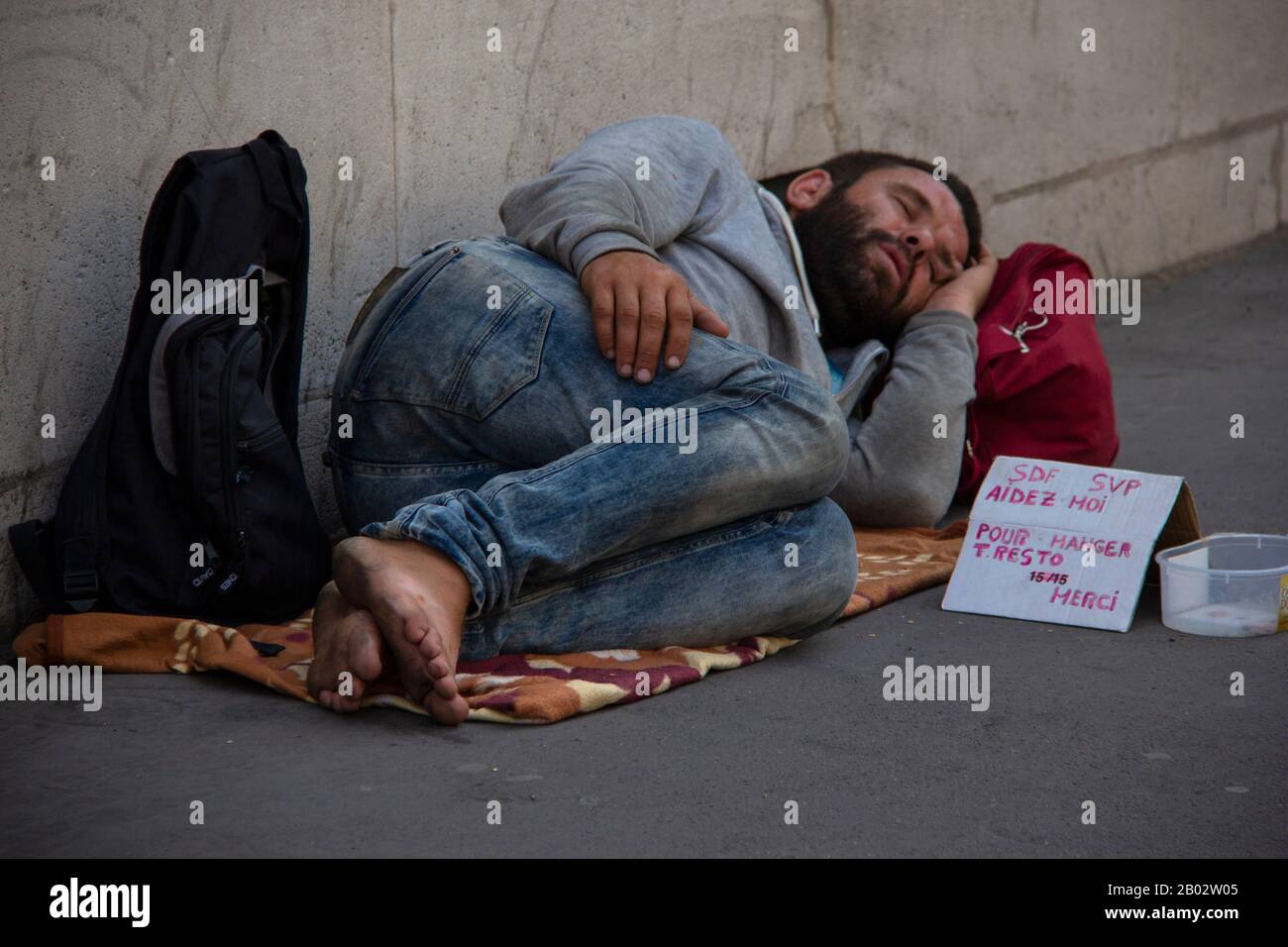 Feet of sleeping homeless hi-res stock photography and images - Alamy
