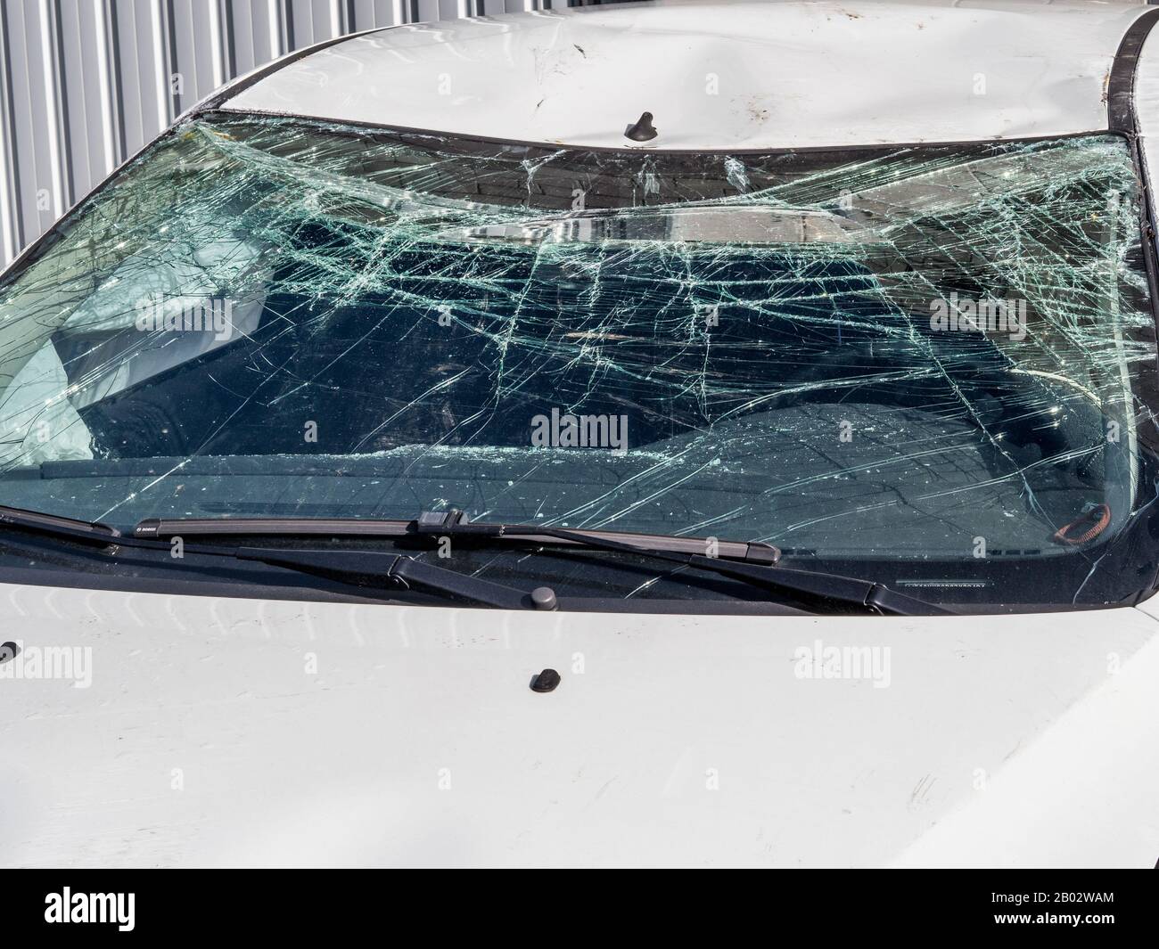 Car with broken windshield Stock Photo - Alamy
