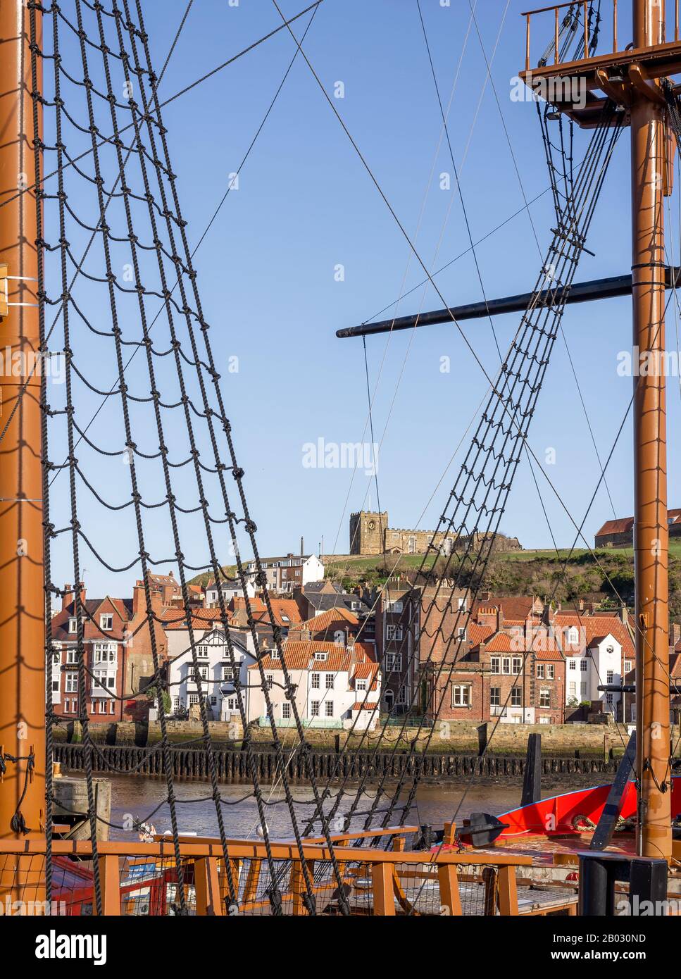 A view of Whitby town seen thorough the rigging of the replica of HMS ...