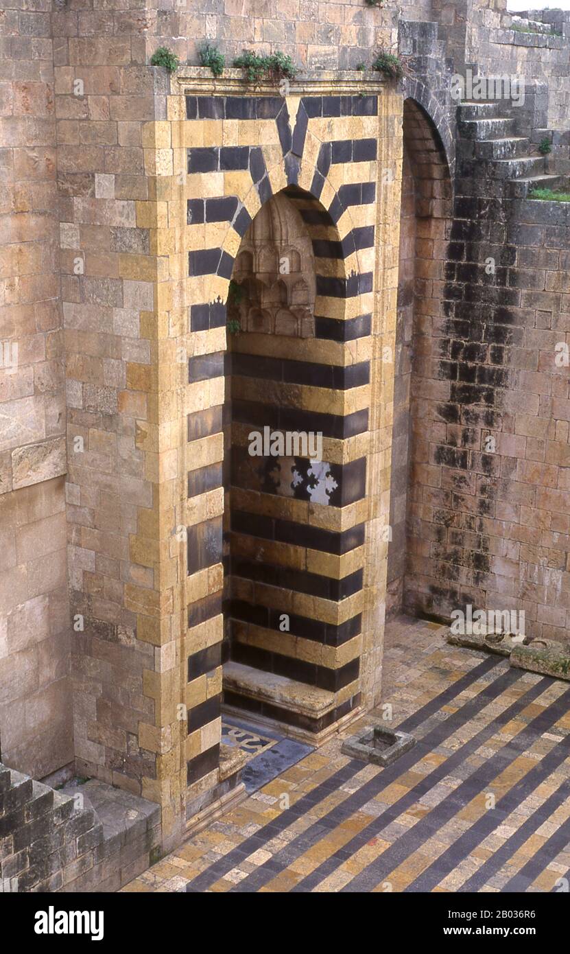 The Citadel of Aleppo is a large medieval fortified palace in the ...