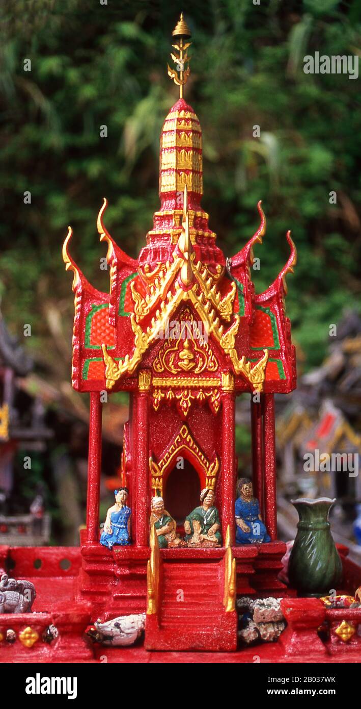Thailand: Spirit houses line the road on the border between Chiang Mai ...