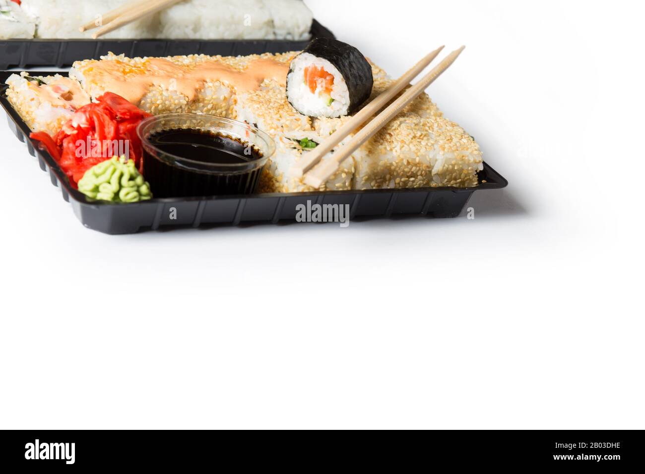 set of sushi to go with copy space. Different sushi in plastic boxes ...