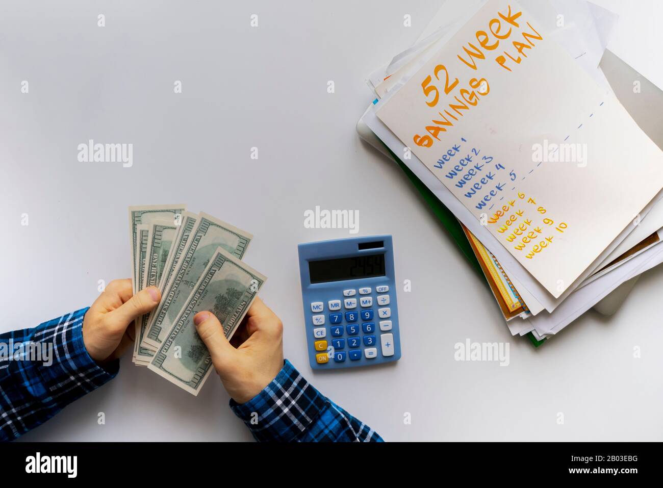 a 52 week saving plan, person count money and calculate the future ...