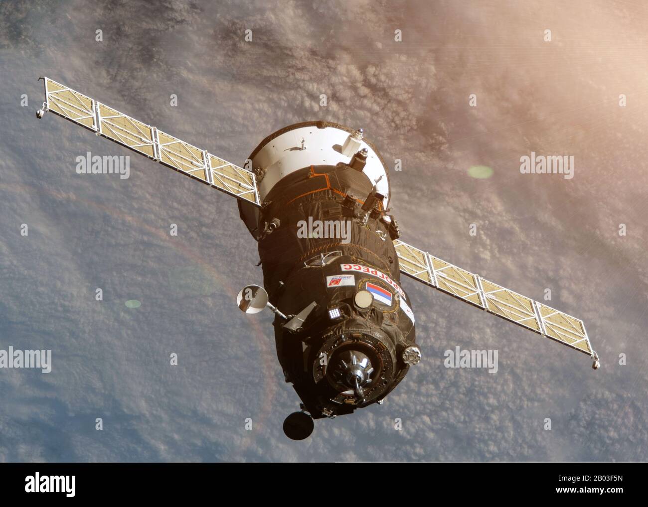 The Progress spacecraft is piloted by astronauts in orbit of planet ...