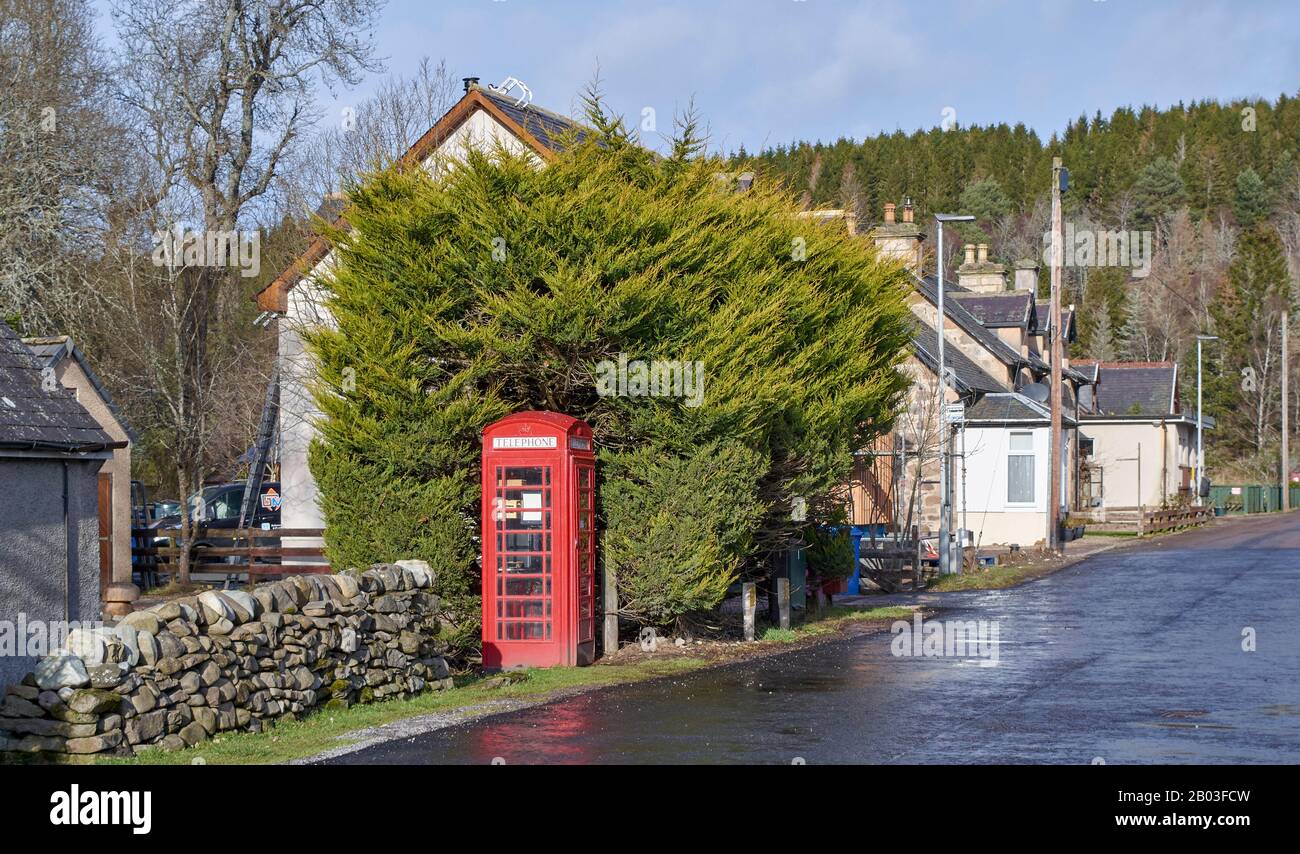 CARRON VILLAGE MORAY SCOTLAND A RED TELEPHONE BOX CONTAINS SNACKS AND ...