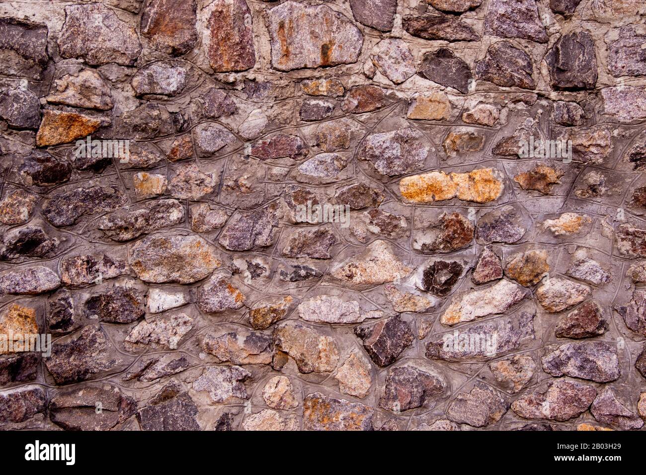 Stone masonry background as in the old castle wall Stock Photo - Alamy