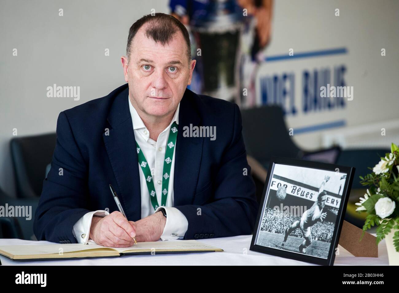 Patrick Nelson, Chief Executive of the IFA, signs the book of ...