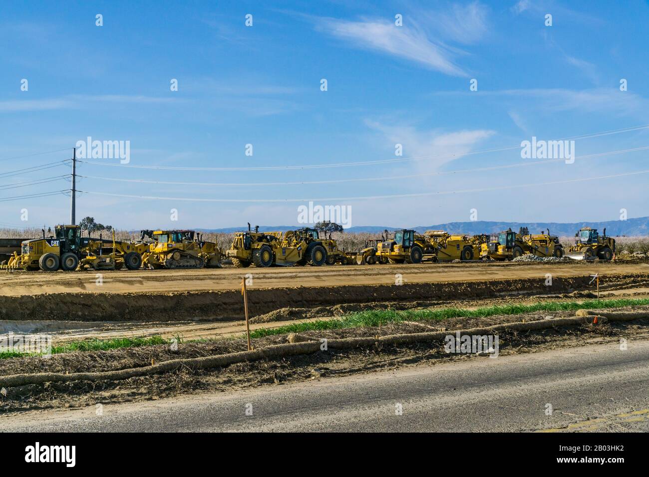 Heavy Equipment lined up in Modesto California USA for the rerouting of ...