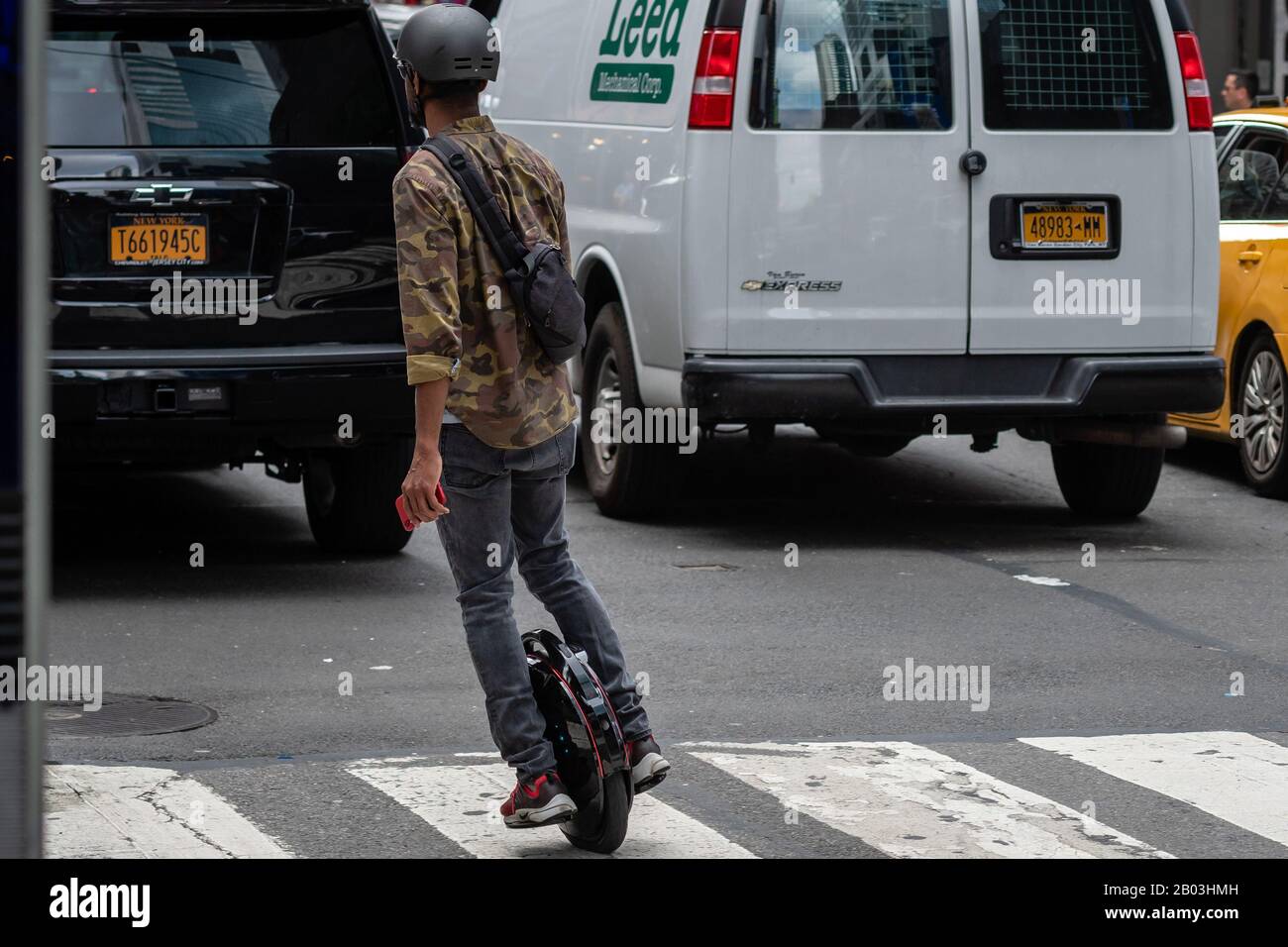 Unicycle hi-res stock photography and images - Alamy