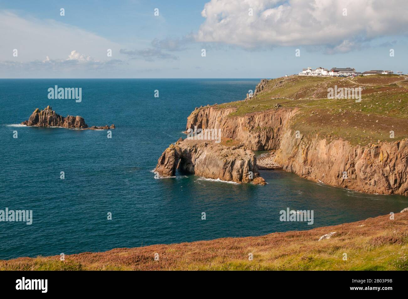 Looking north across bays of the dramatic Cornish coast to Enys Dodnan ...