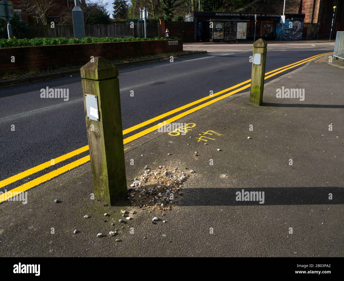 slip road and bus stop with yellow markings Stock Photo - Alamy
