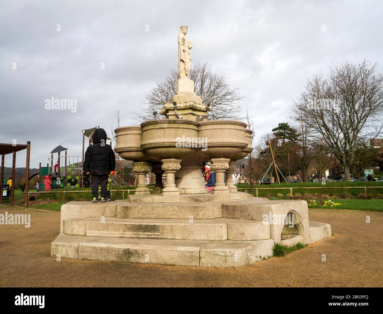 Lost child in a park looking for his parents Stock Photo - Alamy