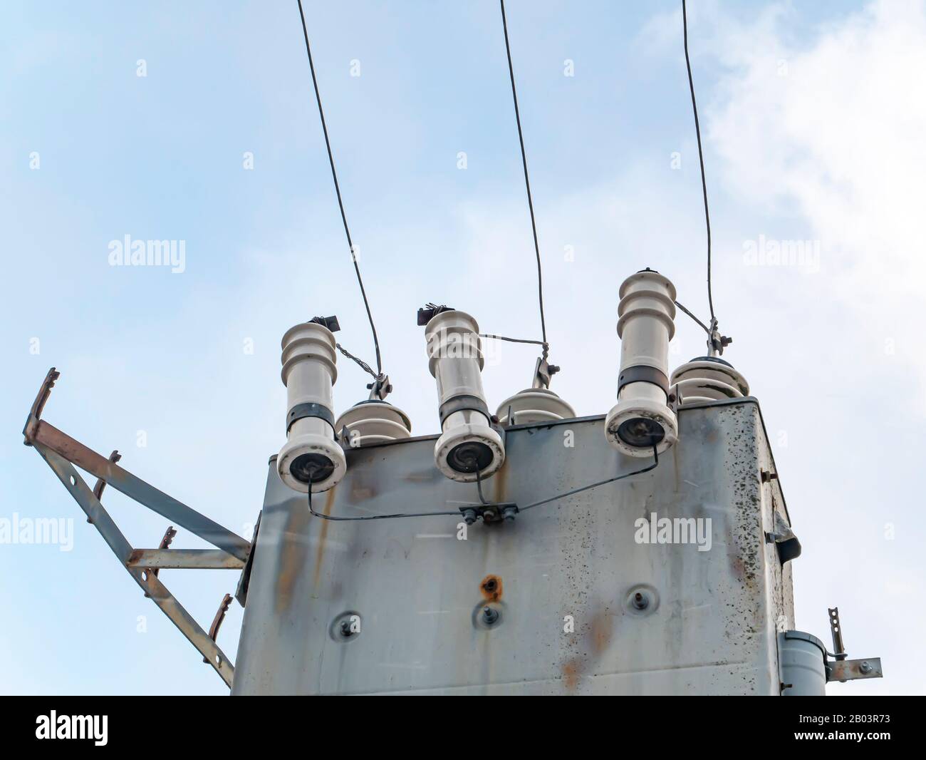 High-voltage power line transformer with wires. Technology. Industry ...