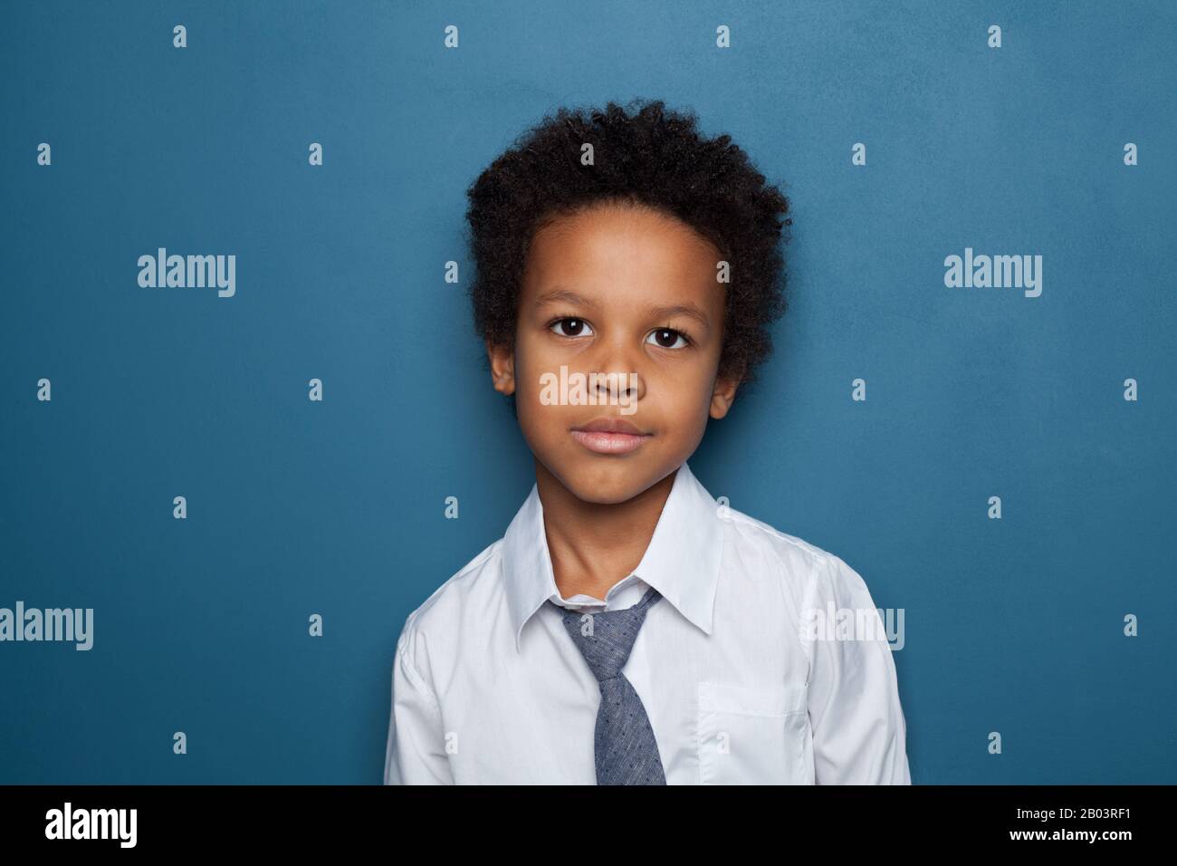 Smart black child boy portrait Stock Photo - Alamy