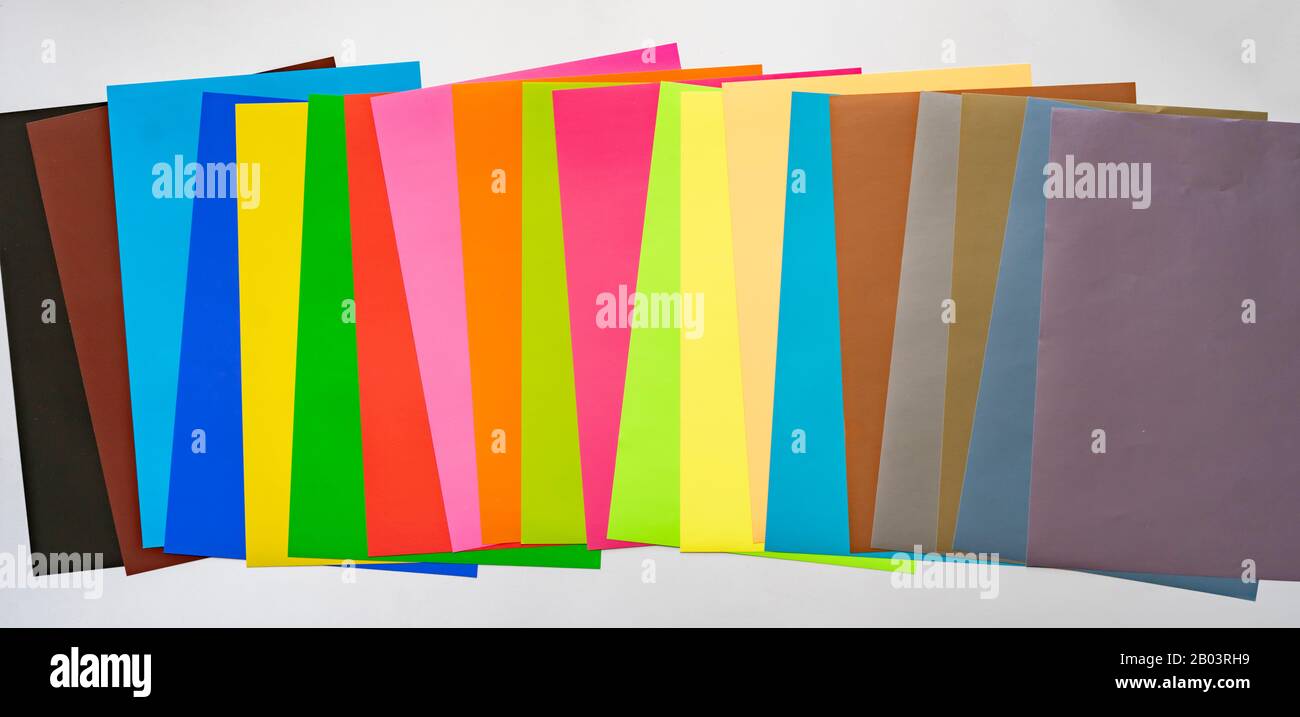 various sheets of color paper mix flat lay abstract background Stock ...