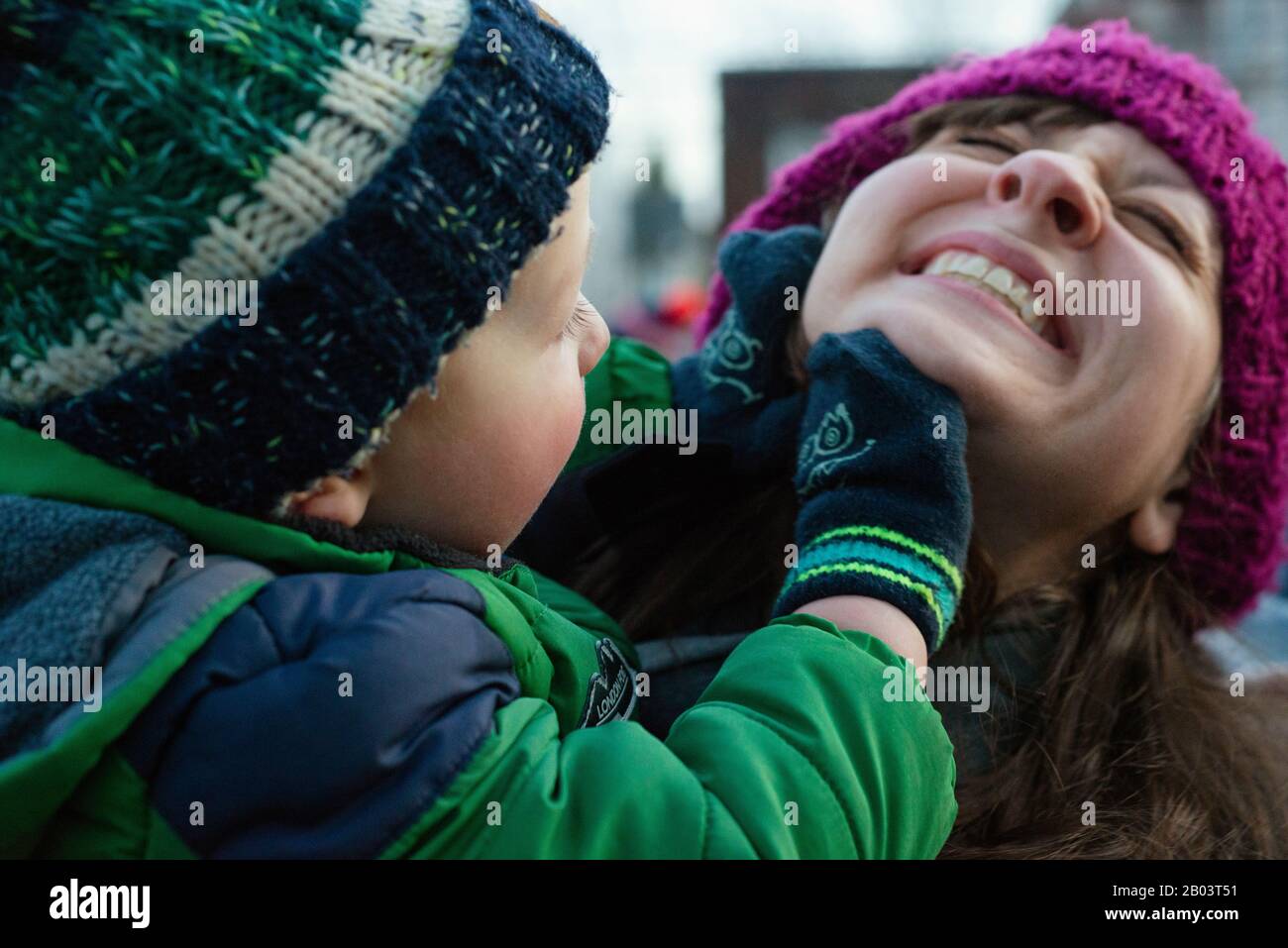 A toddler son hitting his mother Stock Photo - Alamy