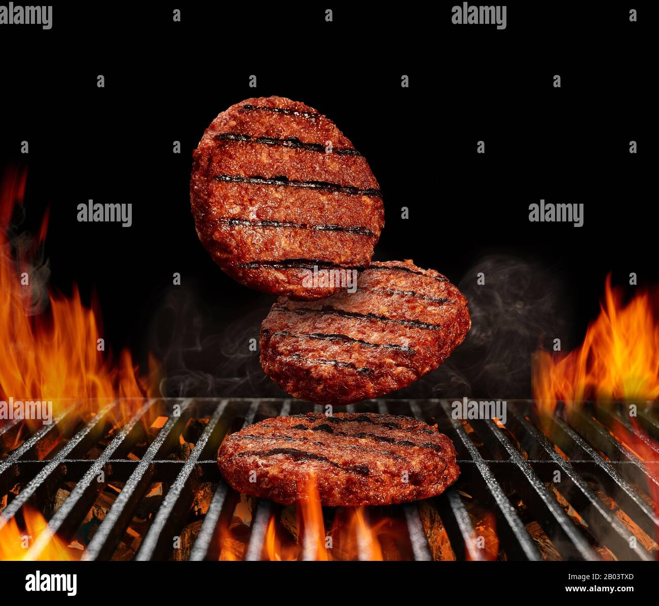 Falling down beef cutlets for burgers. Process of preparing. Meat ...