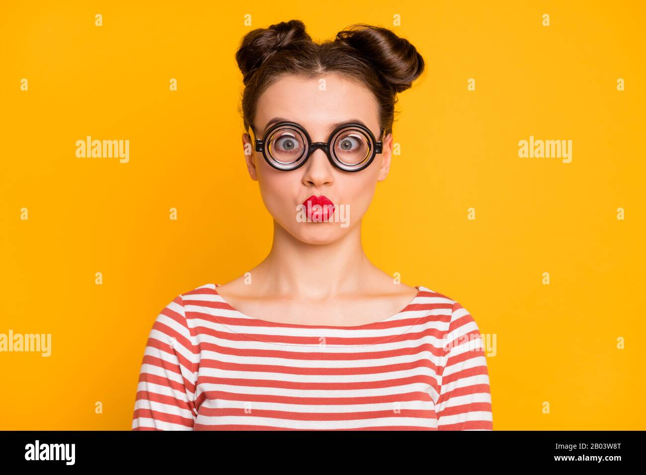 Closeup photo of crazy funny lady student grimacing sending air kiss ...