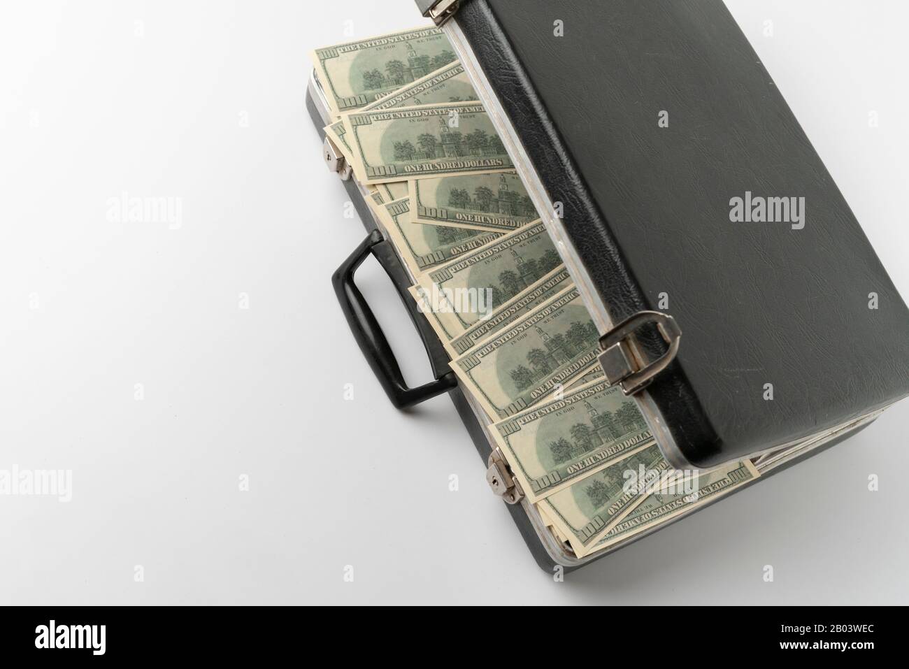 opened vintage case full of cash dollar money, hundred banknote on ...