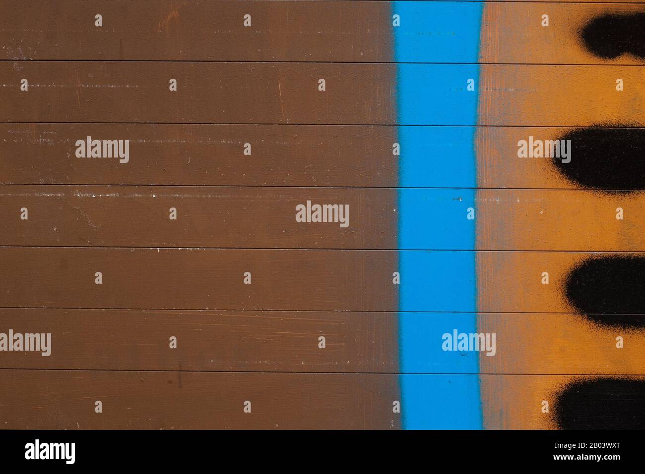 metal shutter on a locked up shop with spray paint Stock Photo - Alamy