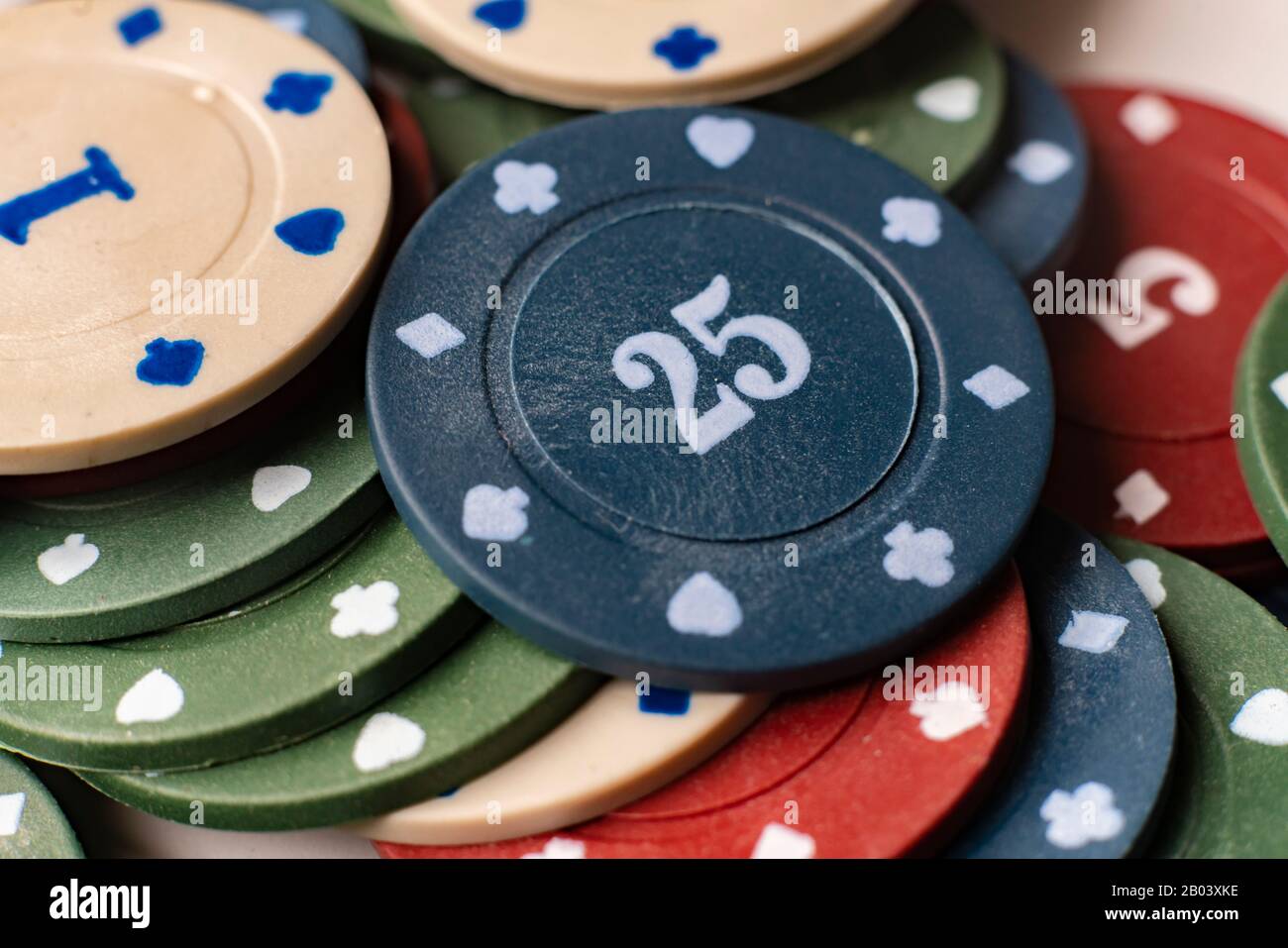 a macro view of different color poker playing chip Stock Photo - Alamy