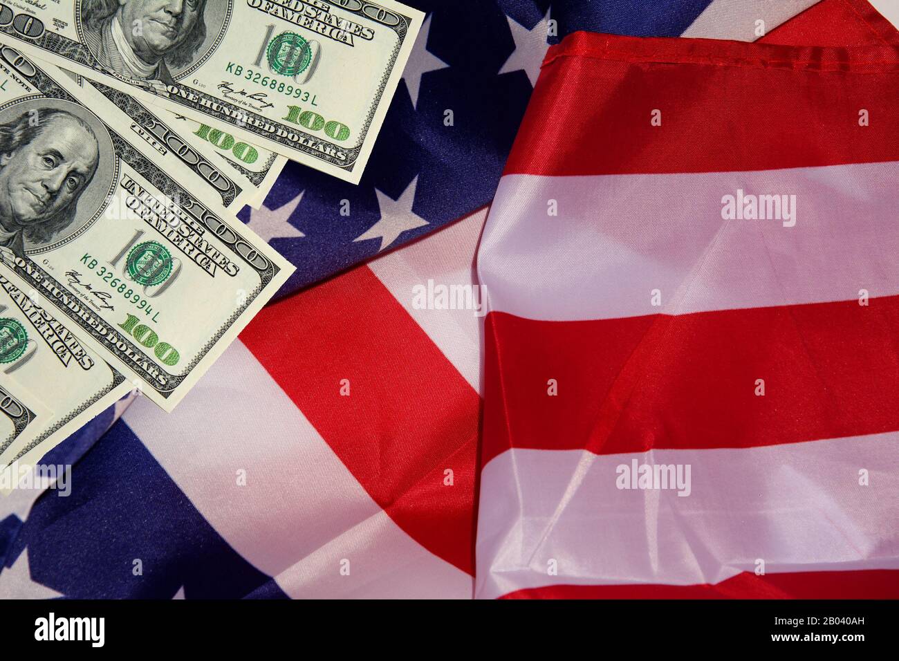 US dollar money cash currency on American flag background. American ...