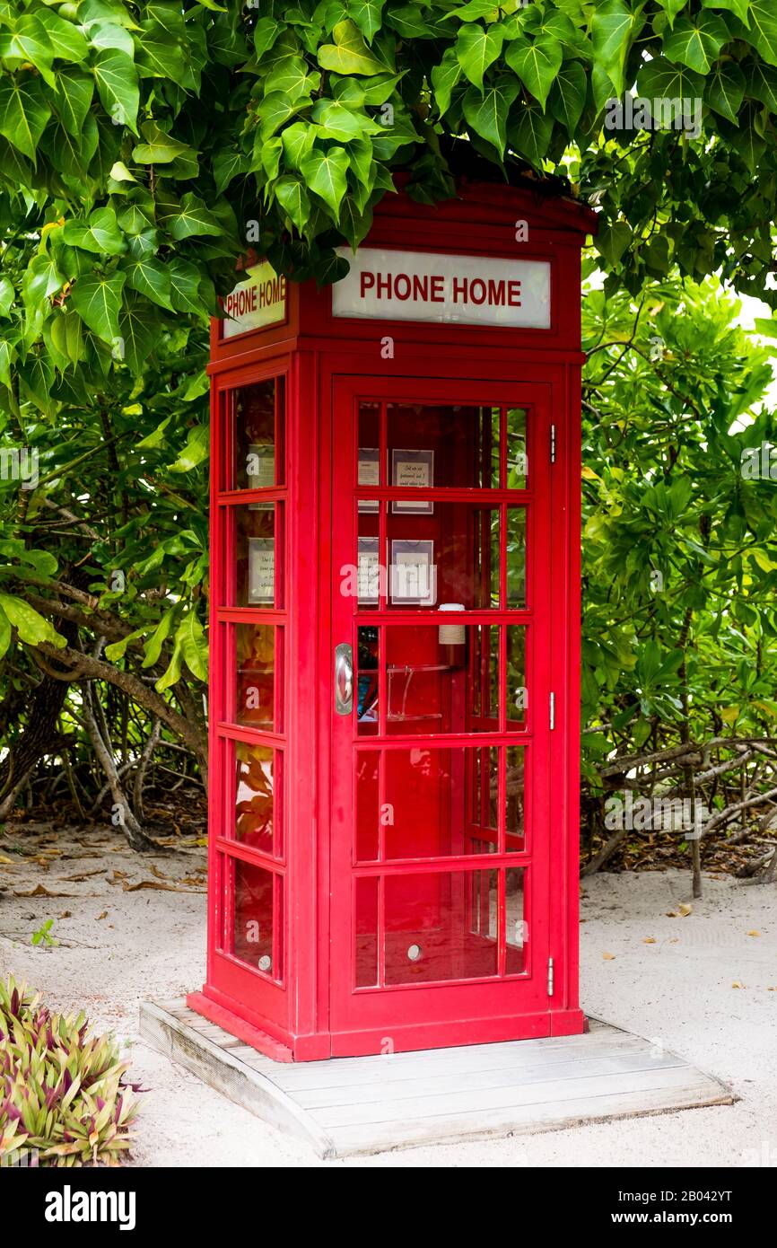 a red phone booth in a beach in maldives Stock Photo - Alamy
