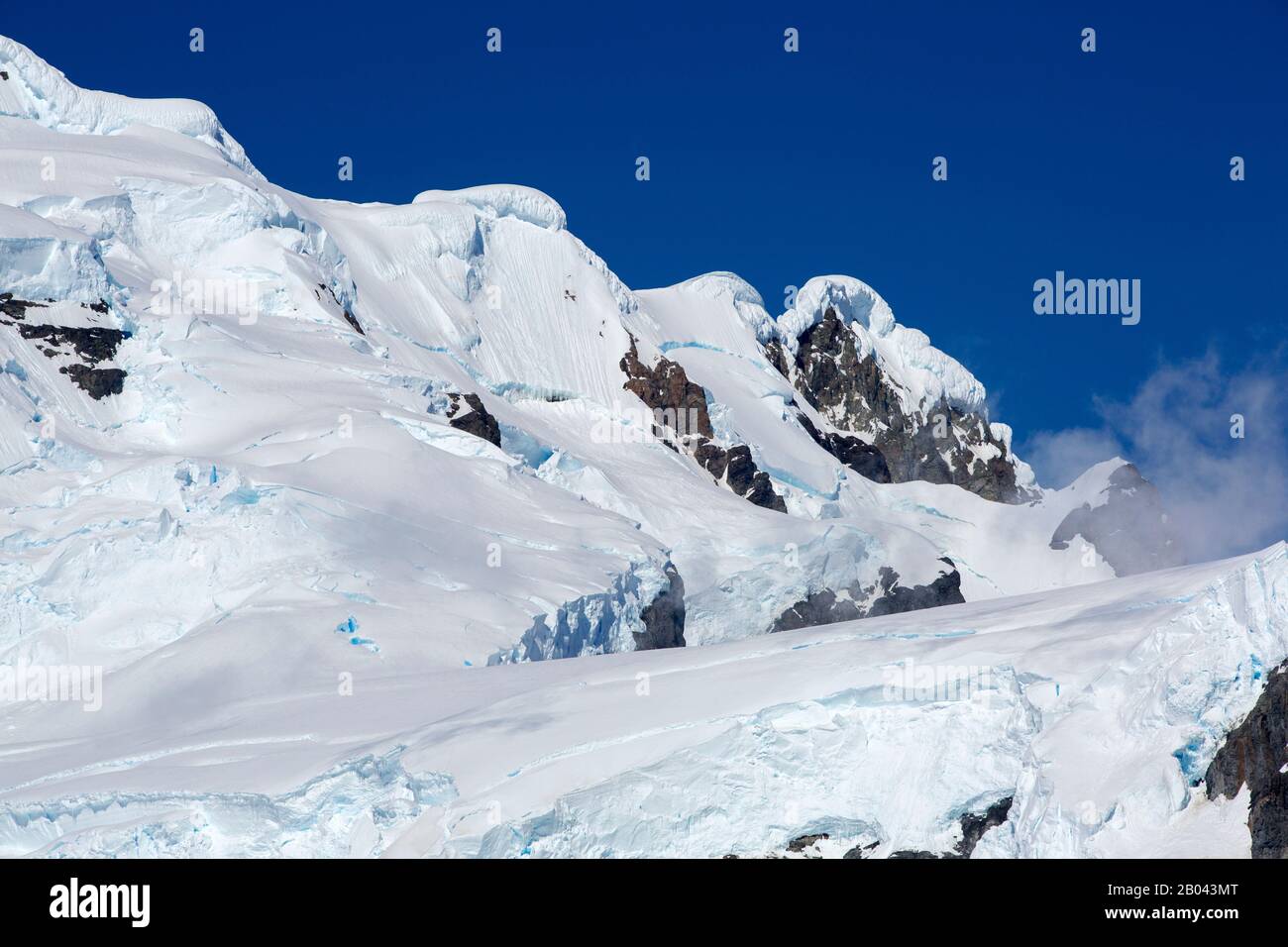 Cornices on mountain ridges on Cuverville Island, Errera Channel ...