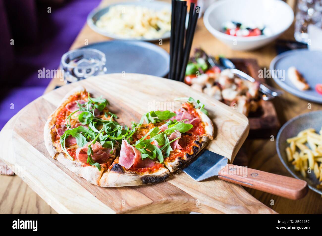 Italian pizza menu classic margarita pizza on the servered table with ...