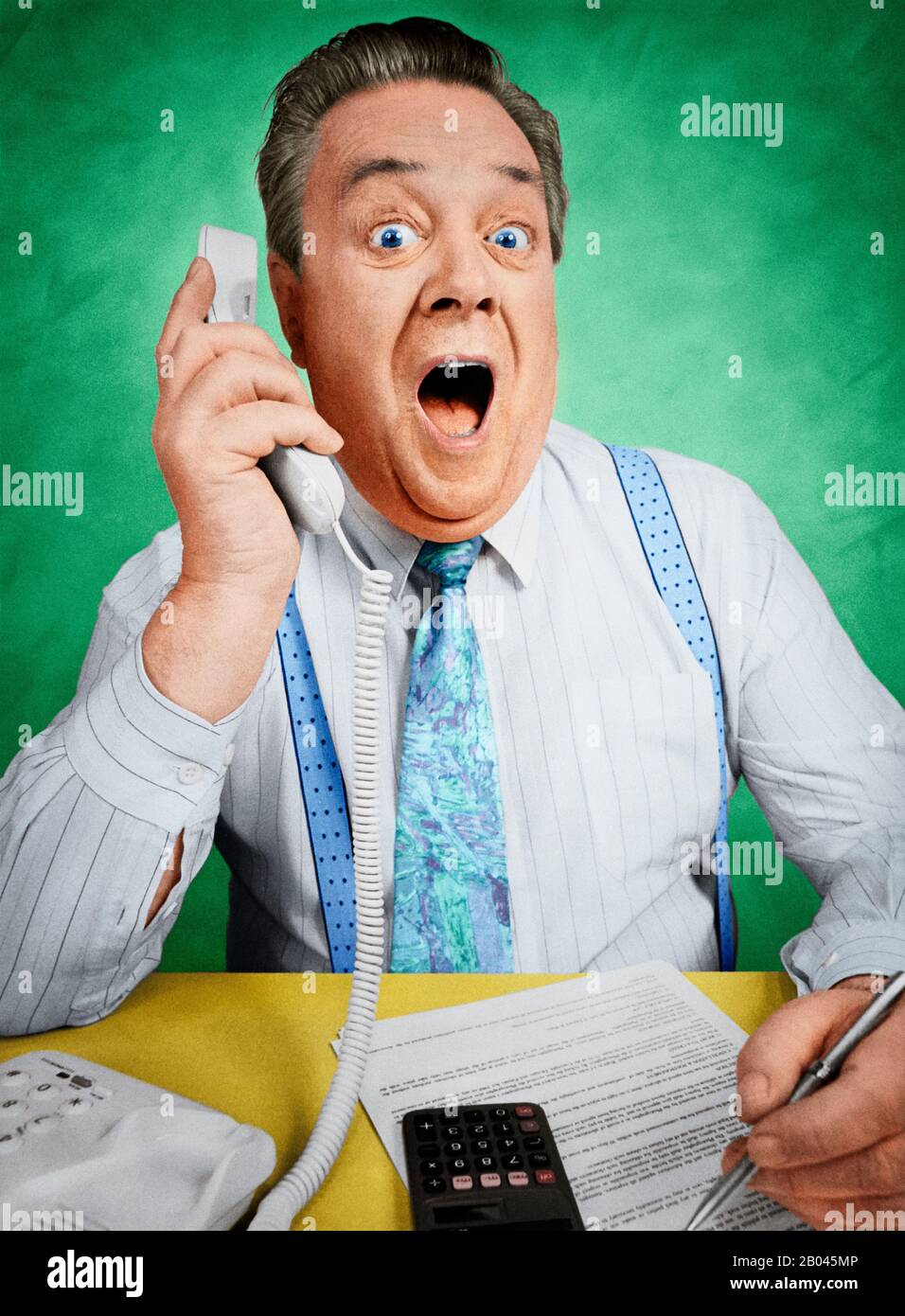 Businessman taking a surprise telephone call Stock Photo - Alamy