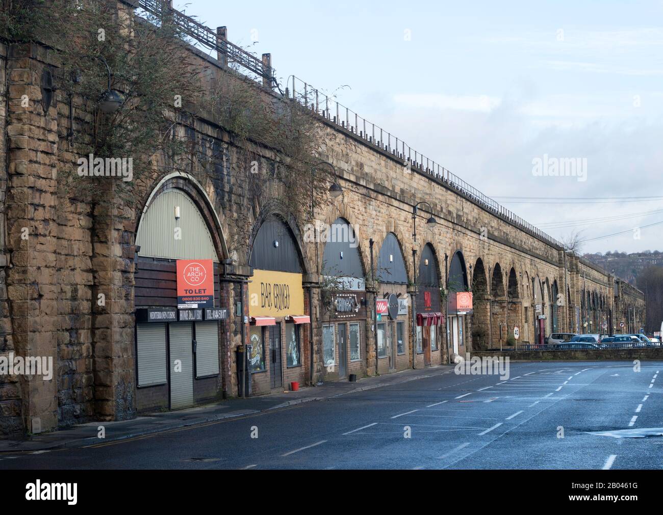 A row of railway arches in Huddersfield, West Yorkshire, England, UK ...