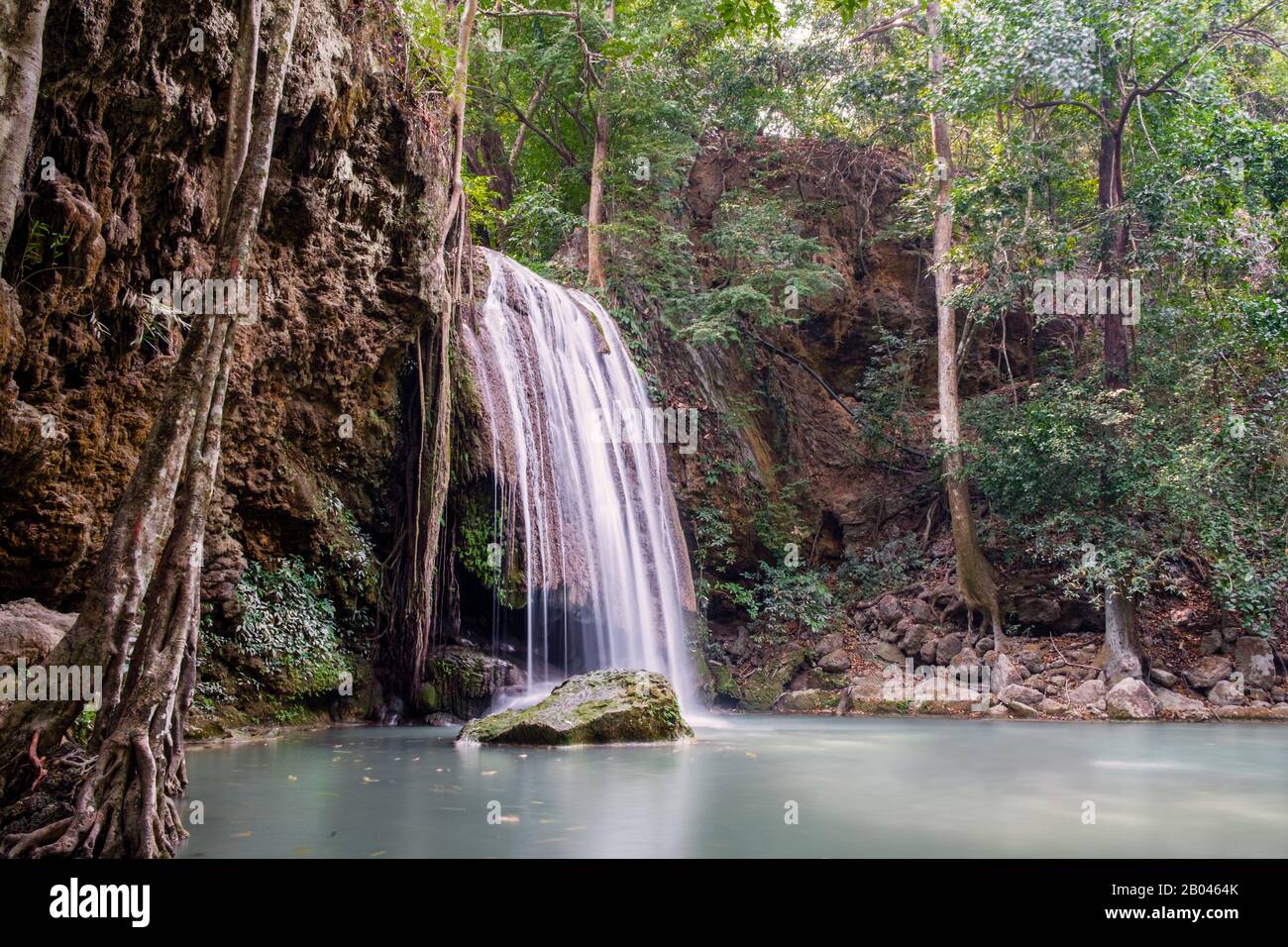 Waterfall in national park in jungle, long exposure, in Kanchanaburi ...