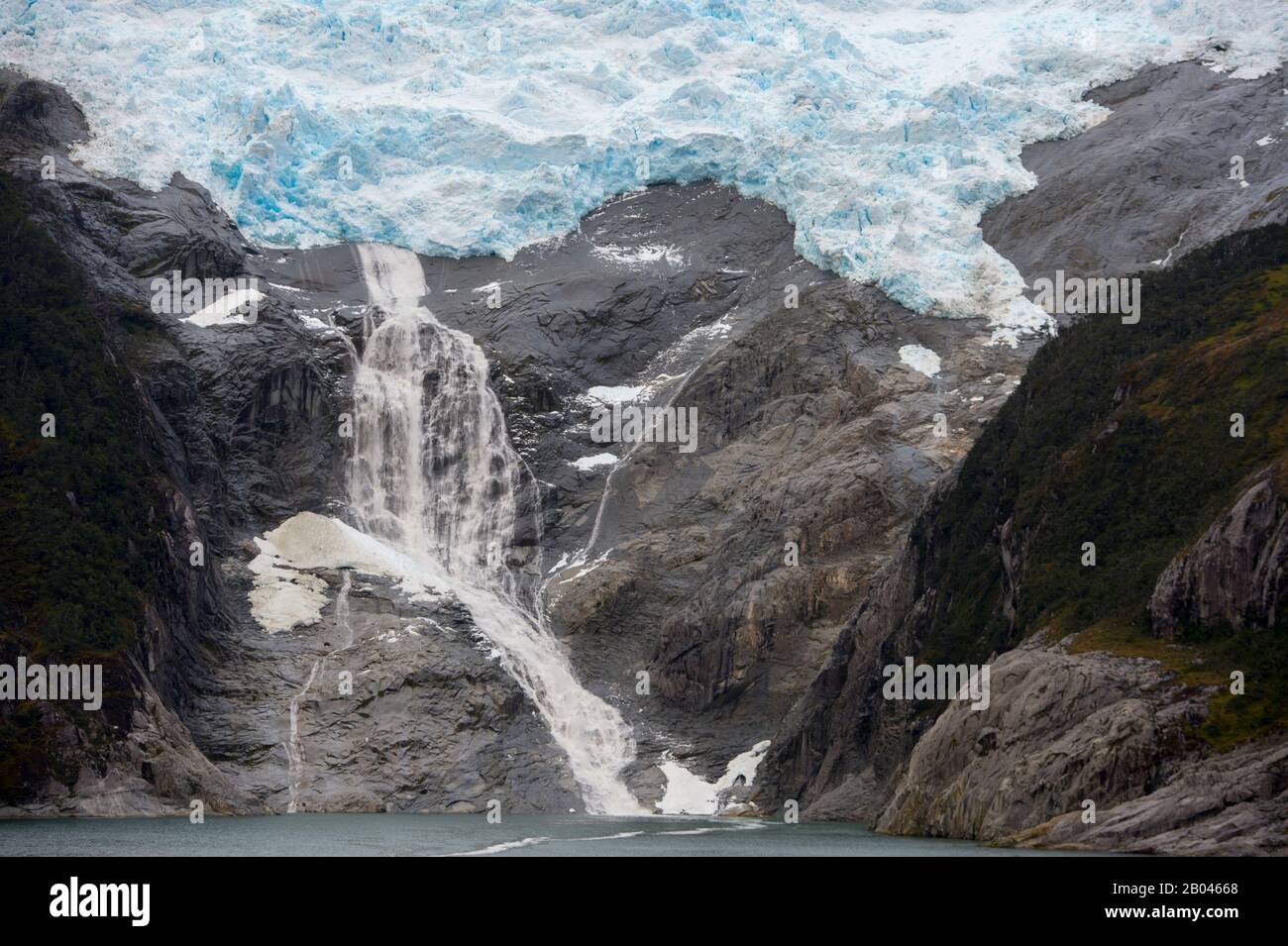View of the Romanche Glacier with waterfall from the Beagle Channel in ...