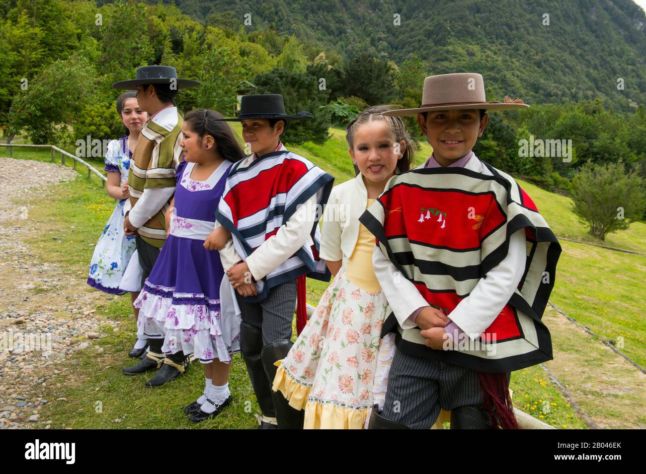 Local children dance group in traditional costumes in Puerto Chacabuco ...