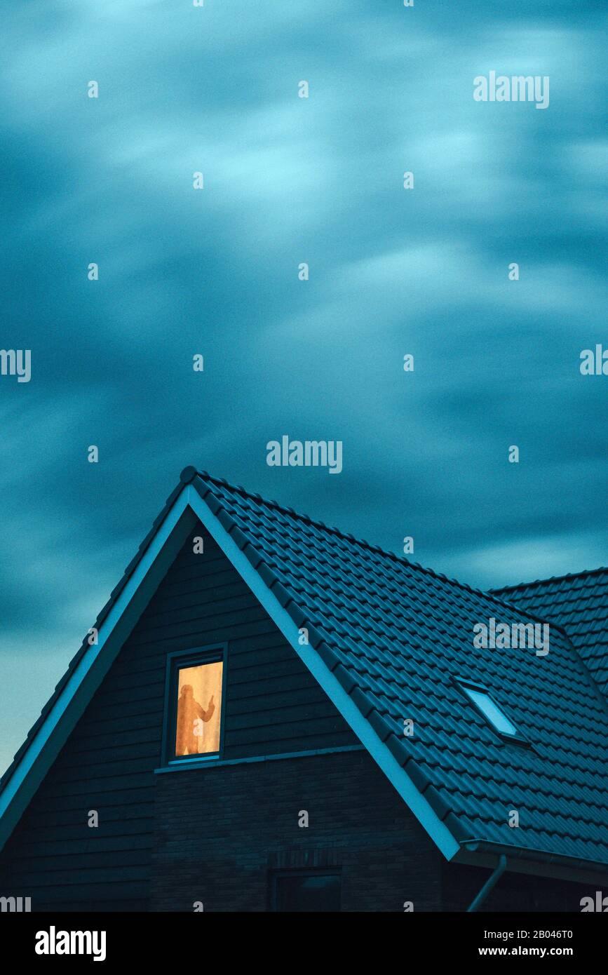 Night illuminated windows man home hi-res stock photography and images ...