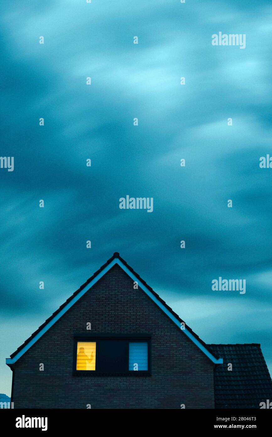 Night illuminated windows man home hi-res stock photography and images ...